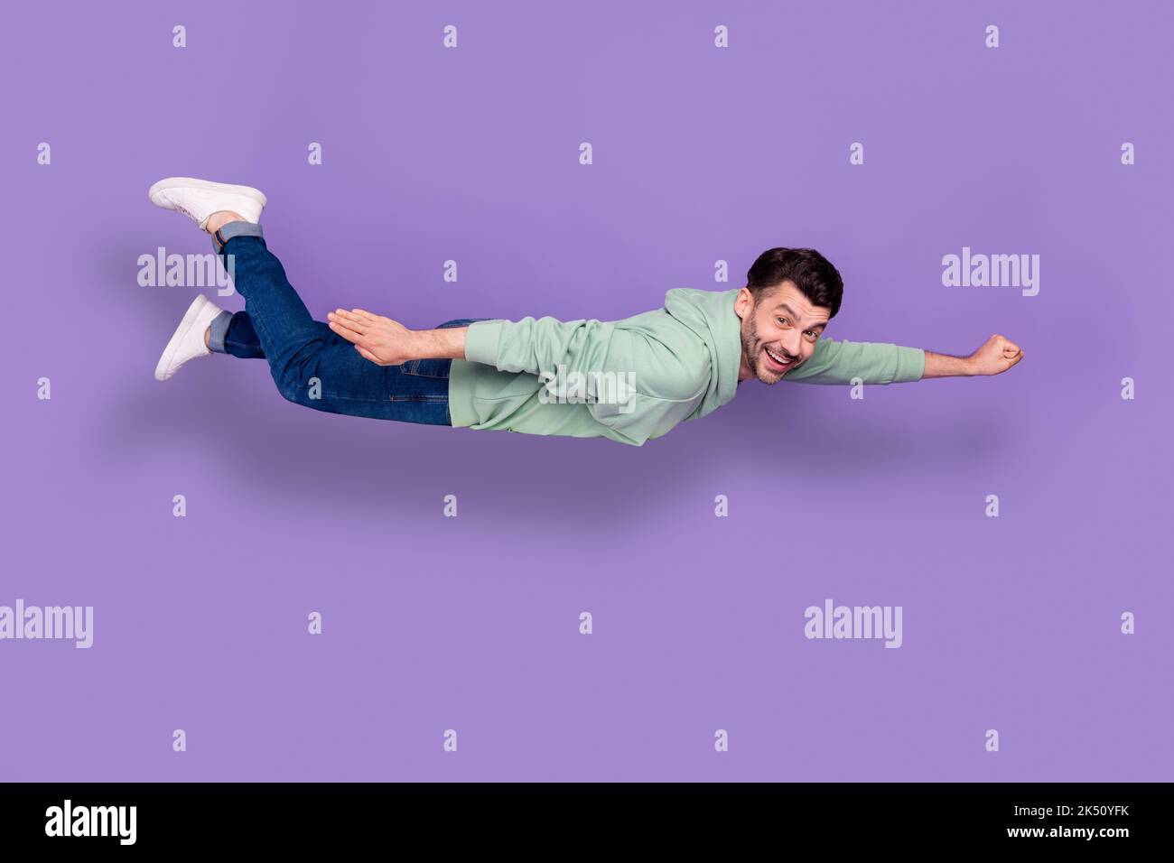 Full size photo of handsome young man flying funky funny superman have ...