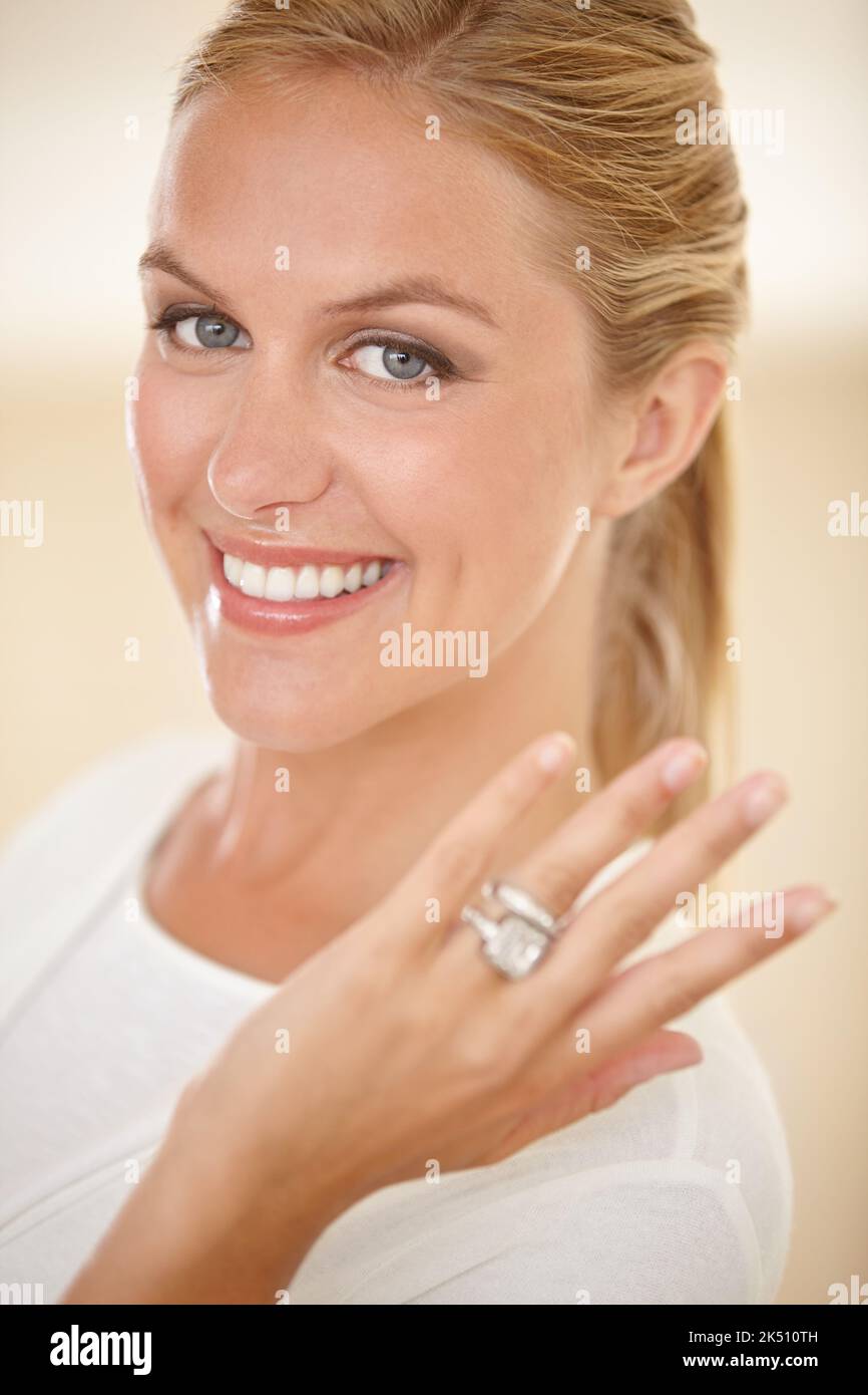 Woman showing off engagement ring hi-res stock photography and images ...