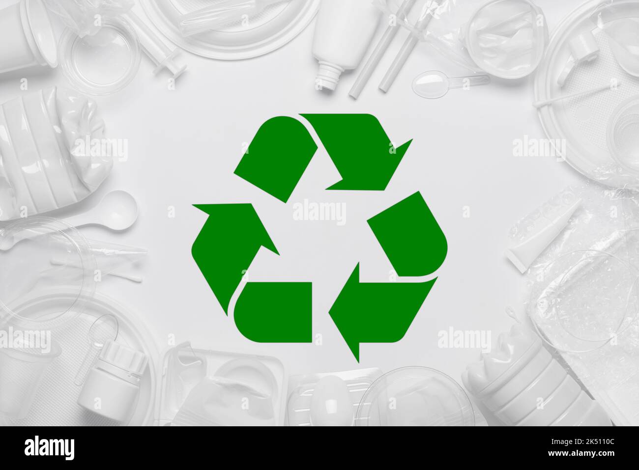 Recycling symbol with plastic waste, single-use plastic objects, white ...