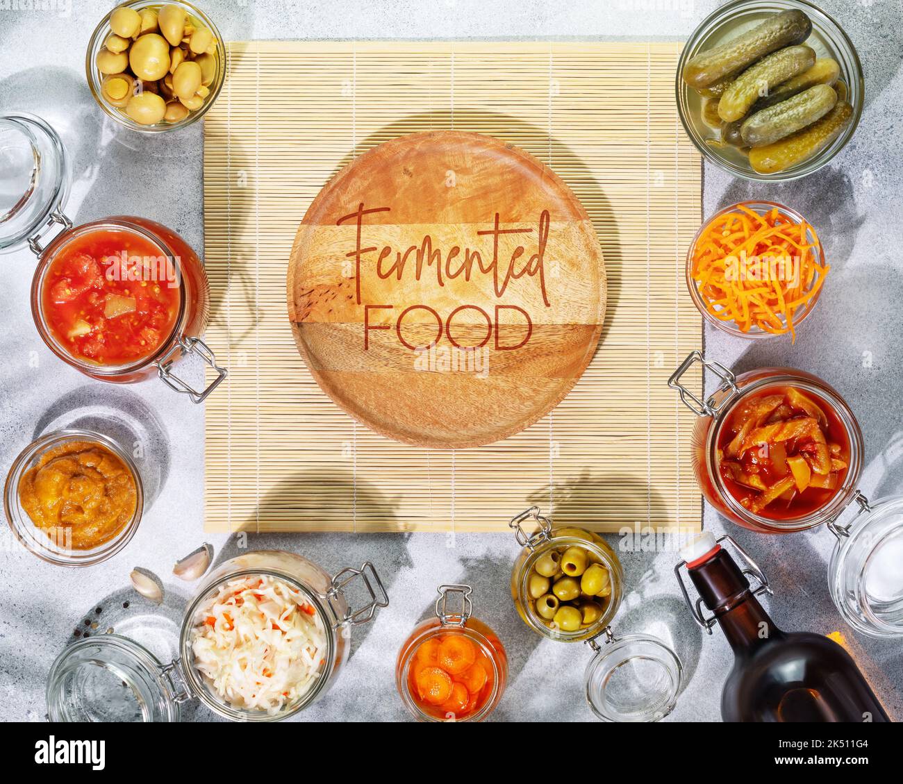 Fermented products vegetables, mushrooms in glass jars, bottle with ...
