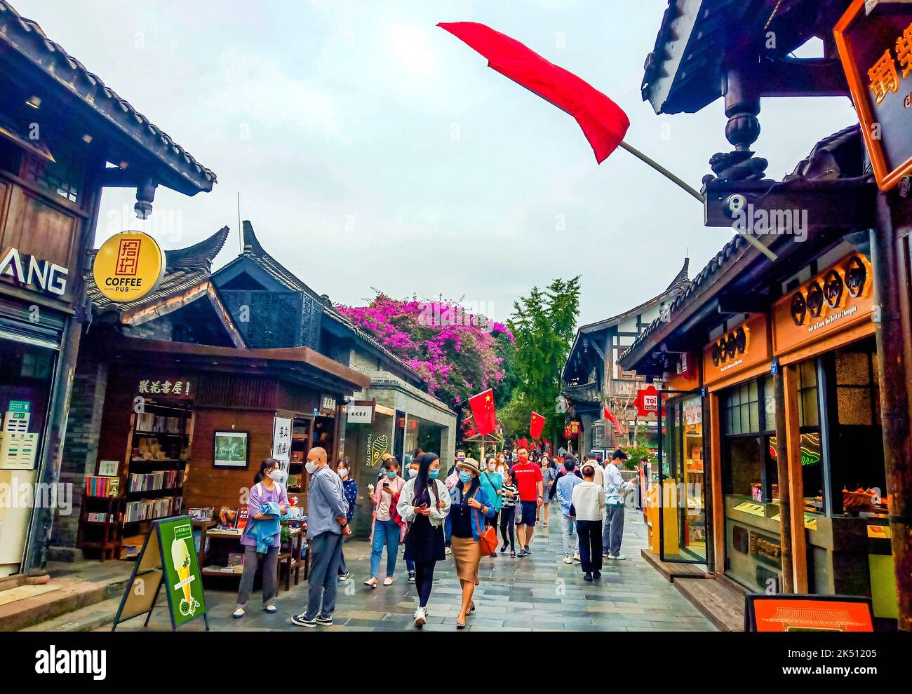 CHENGDU, CHINA - OCTOBER 5, 2022 - Tourists take a tour in Kuanzhai ...