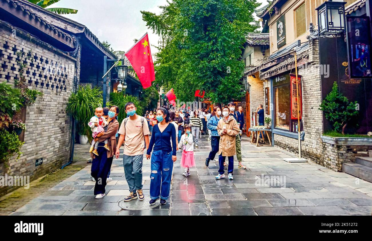 CHENGDU, CHINA - OCTOBER 5, 2022 - Tourists take a tour in Kuanzhai ...