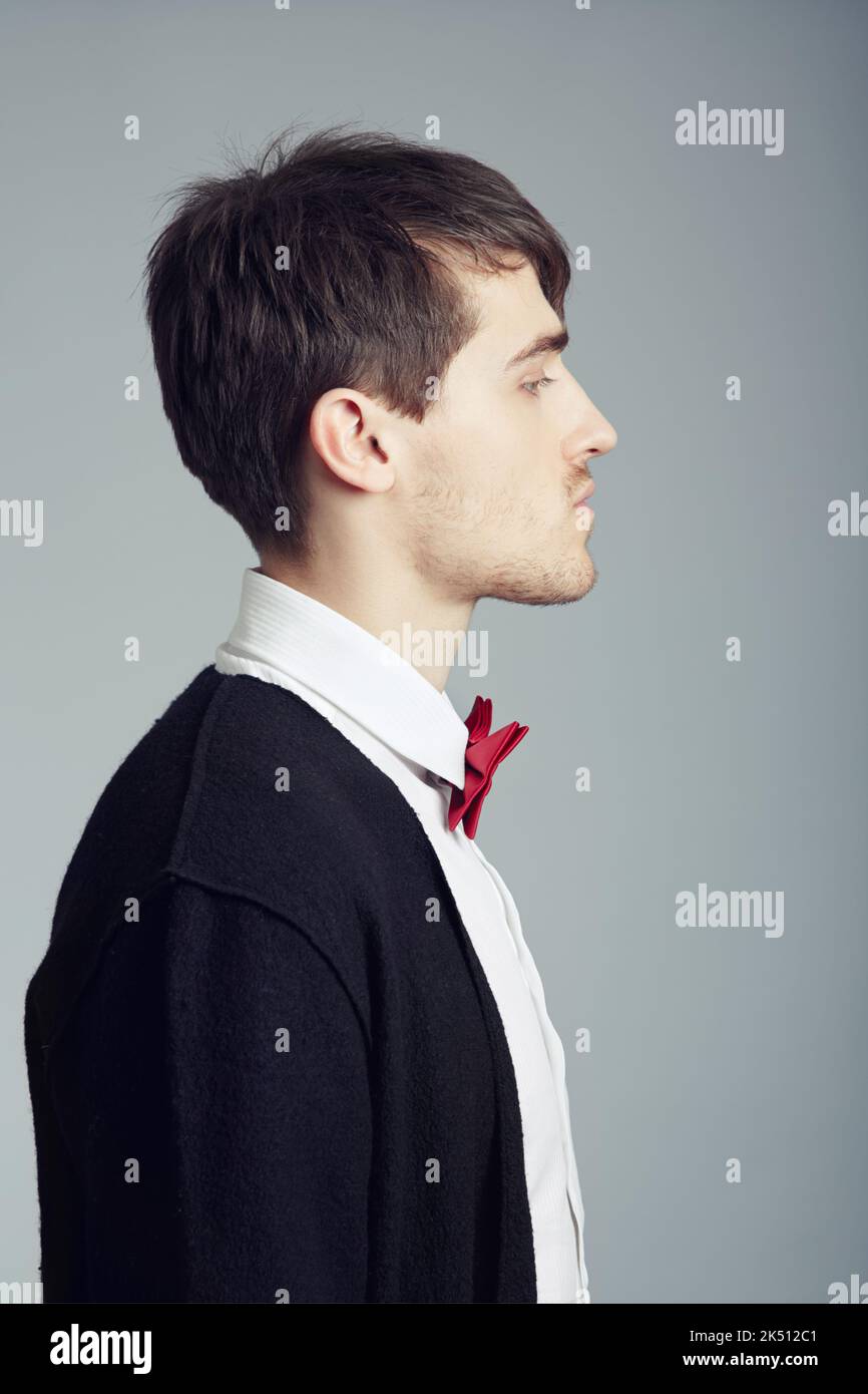 The profile of refinement. a handsome and stylish young man posing in ...