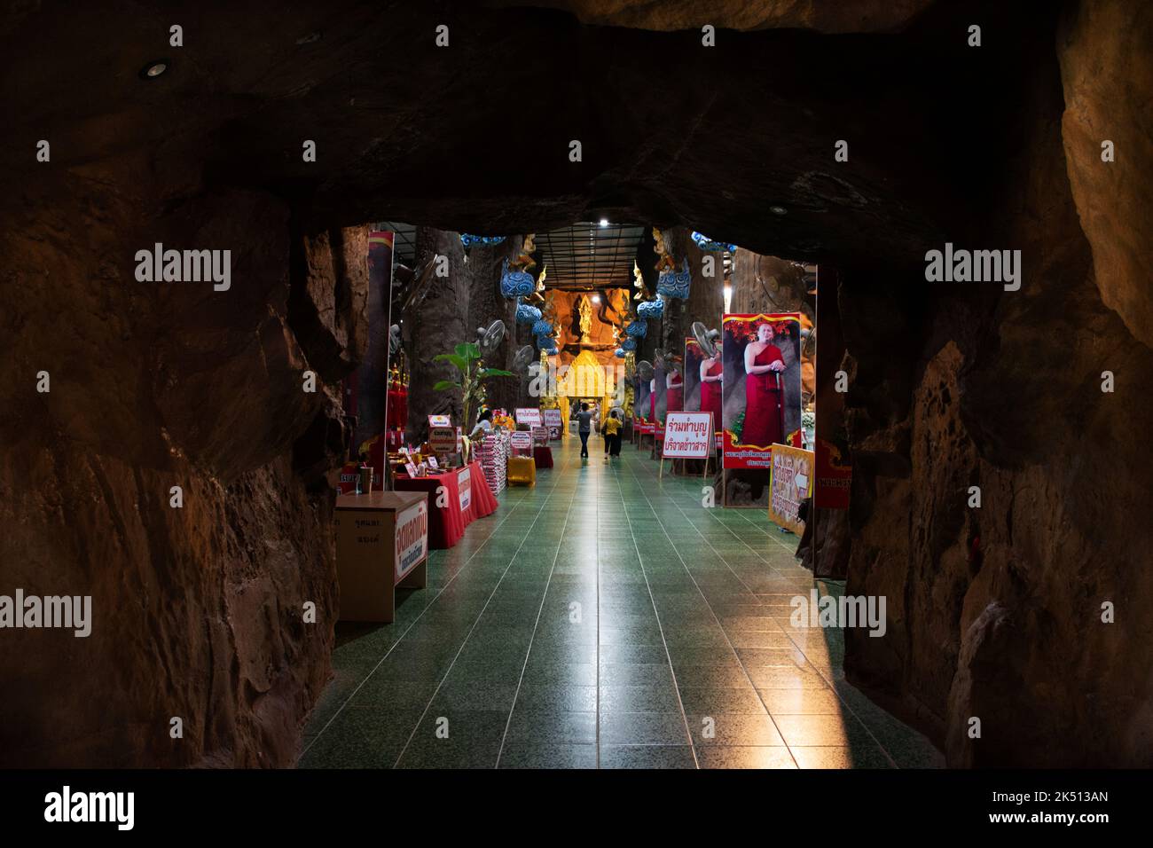 Tunnel gate entrance to naka cave underground for thai people travel visit and respect praying ...