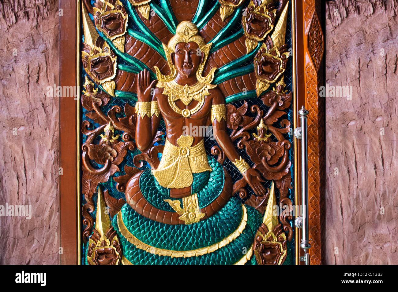Ancient carving deity naka and naga angel frescoes painting on wooden ...