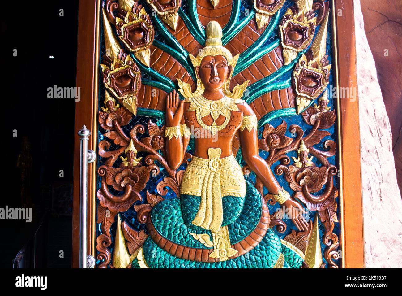Ancient carving deity naka and naga angel frescoes painting on wooden ...