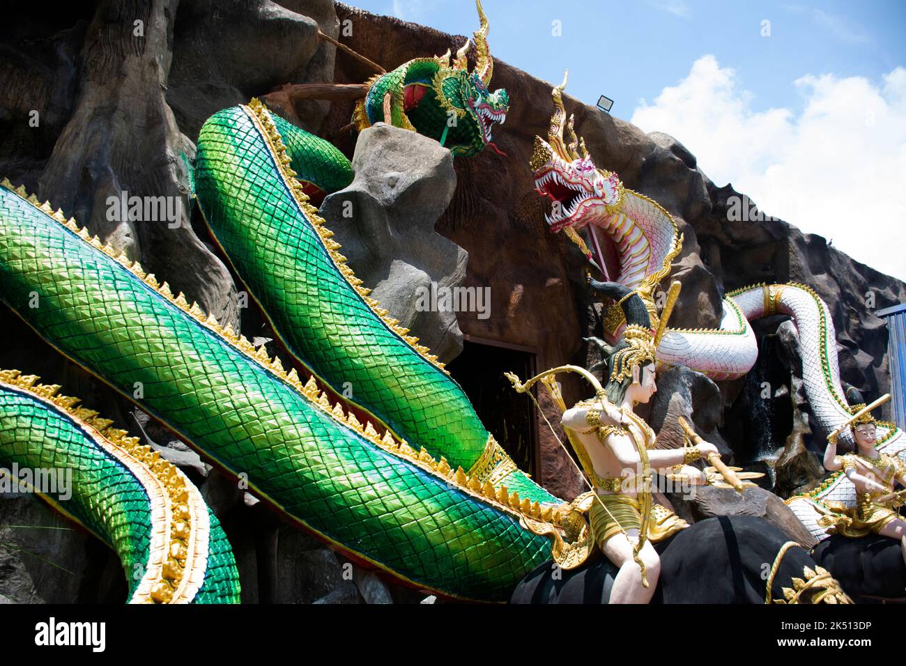 Tunnel gate naga and naka cave statue for thai people travel visit and ...