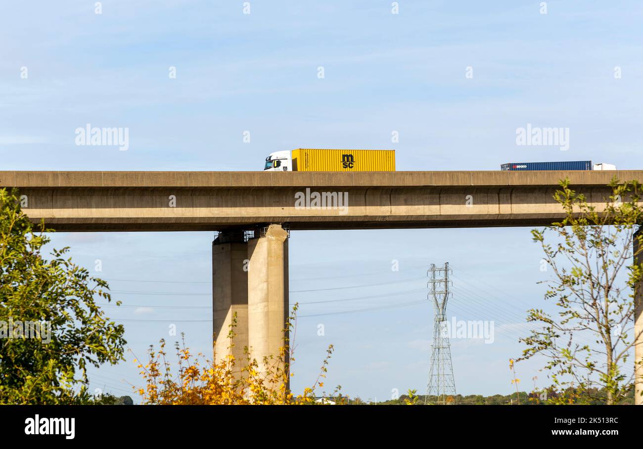 HGV truck lorry MSC container vehicle driving on rasied section of ...