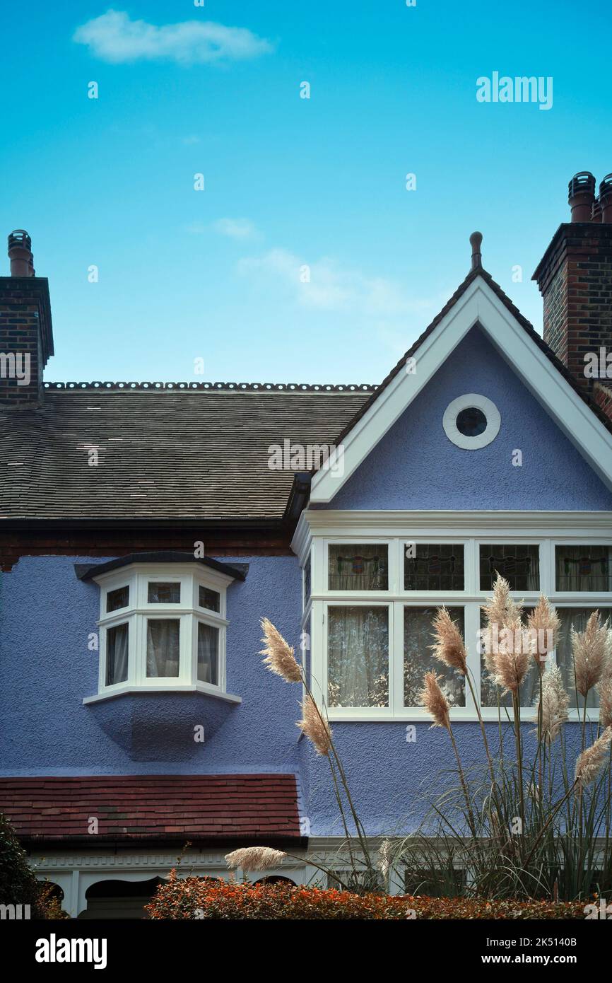Lilac Cottage Against Blue Sky Stock Photo - Alamy