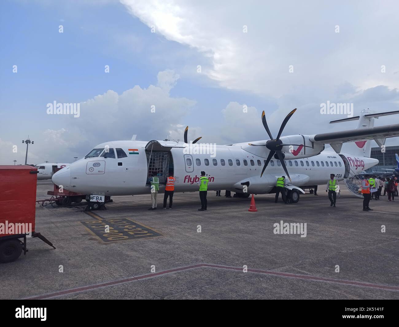 People boarding on a "flybig" ATR flight ready for take off Stock Photo ...