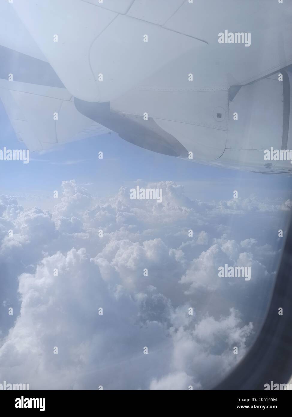 A beautiful view of sky and one engine of a ATR flight from the ...