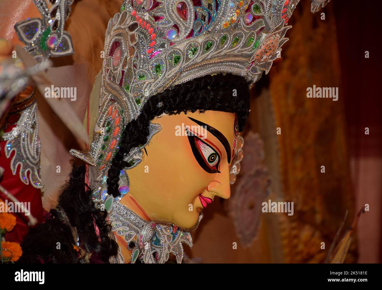 Beautiful side angle shot of Goddess Durga face at a pandal during ...
