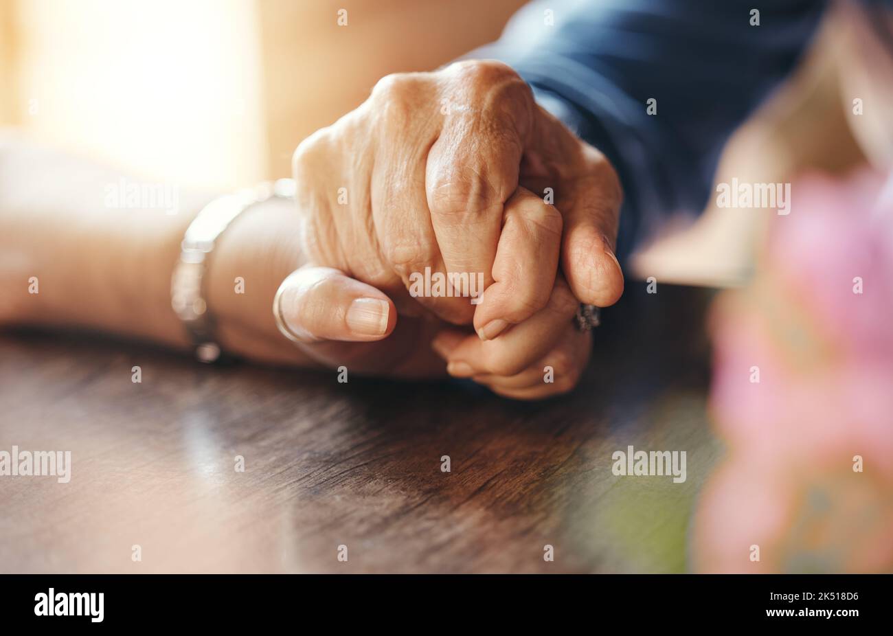 Senior couple holding hands, love and support for trust, retirement and ...