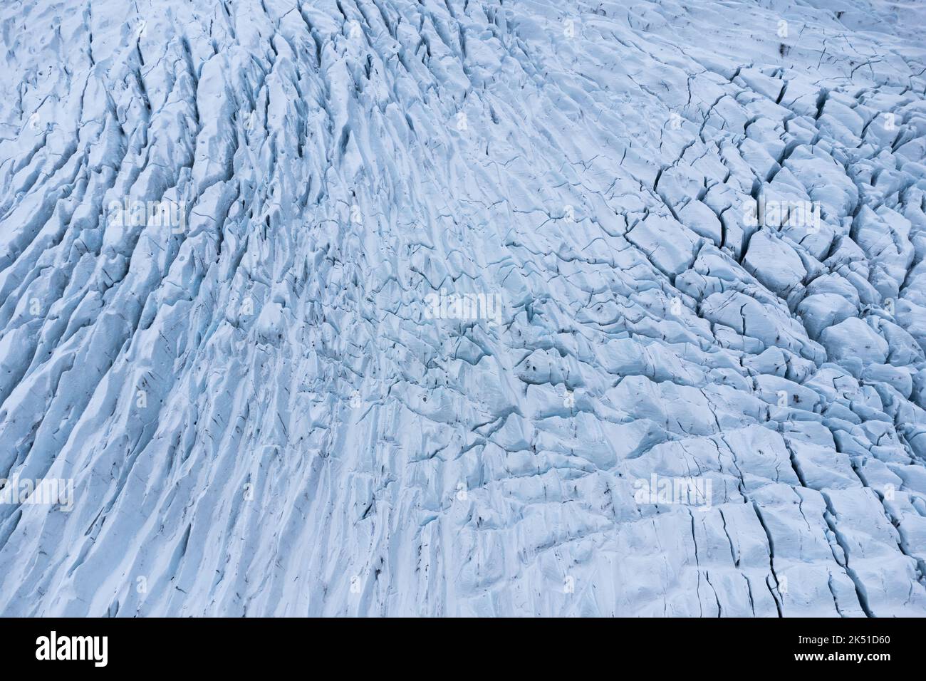 Abstract background of rough texture of massive glacier located in ...