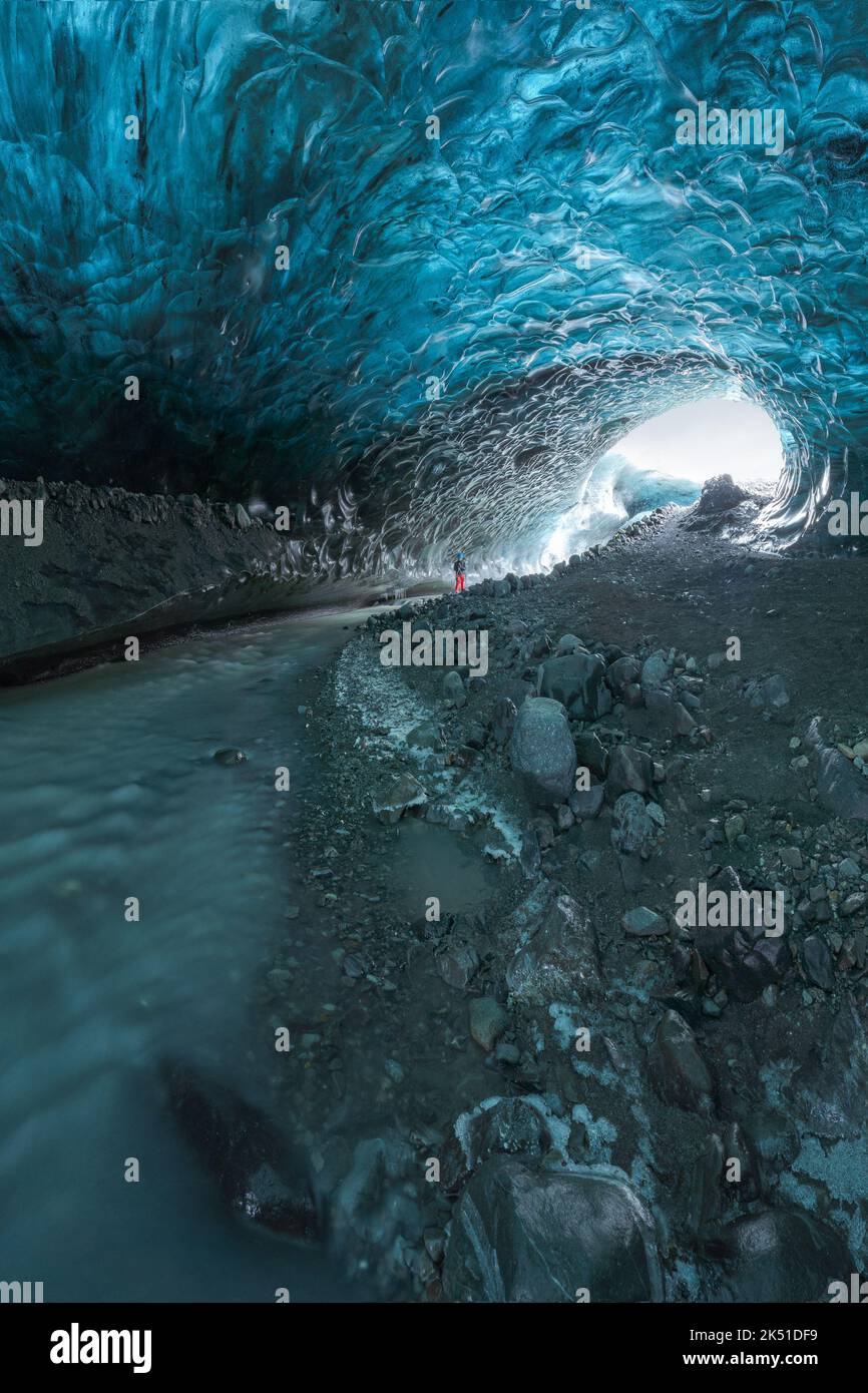 Interior of breathtaking ice cave with wet floor inside Vatnajokull ...
