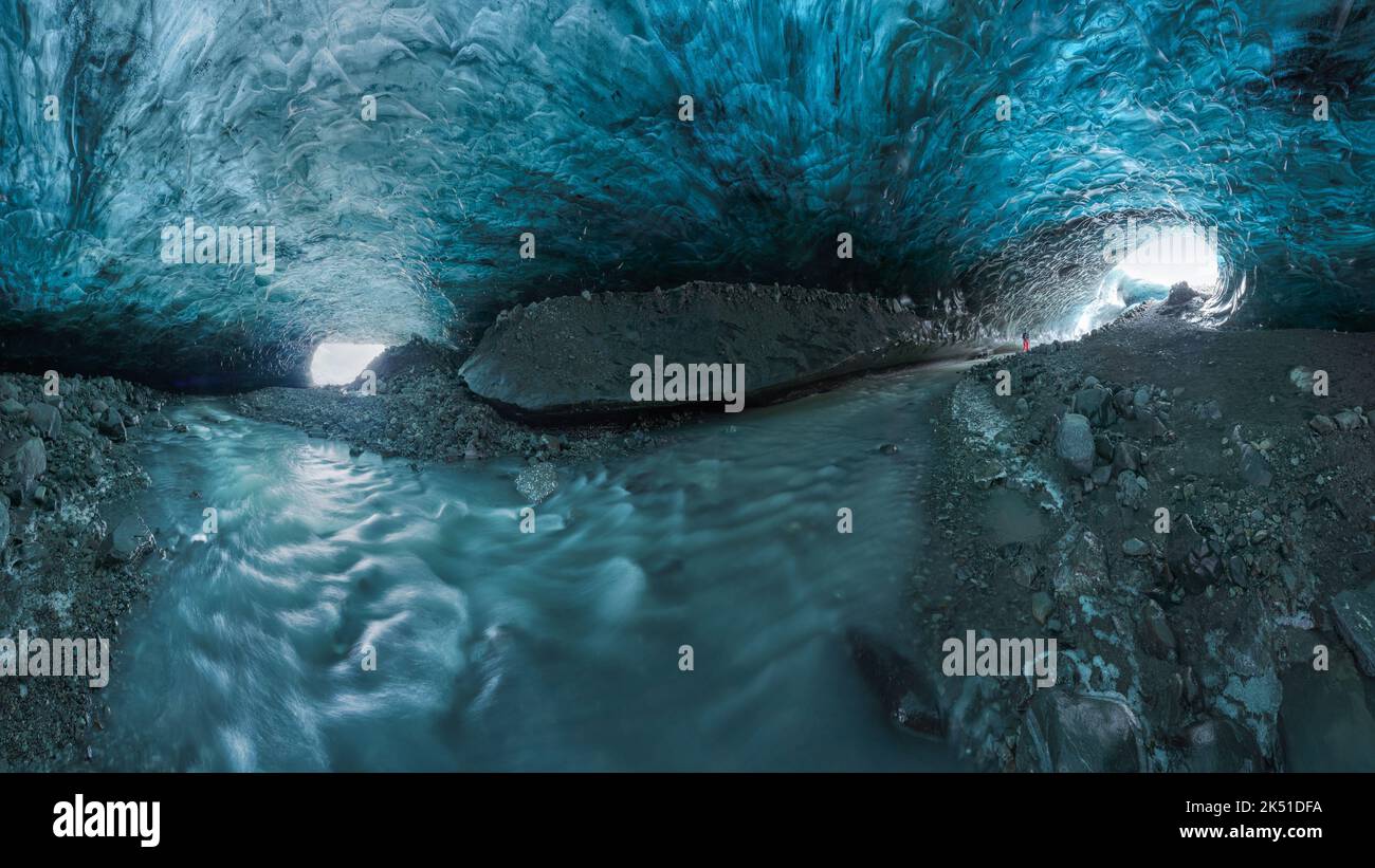 Interior of breathtaking ice cave with wet floor inside Vatnajokull ...