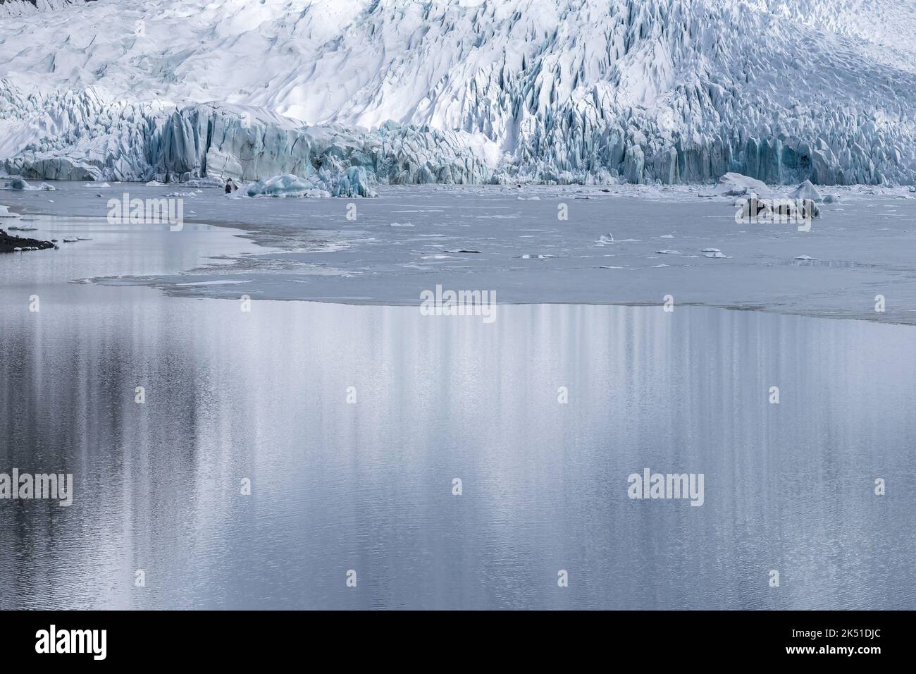 Spectacular scenery of rippling sea surrounded by massive snowy ...