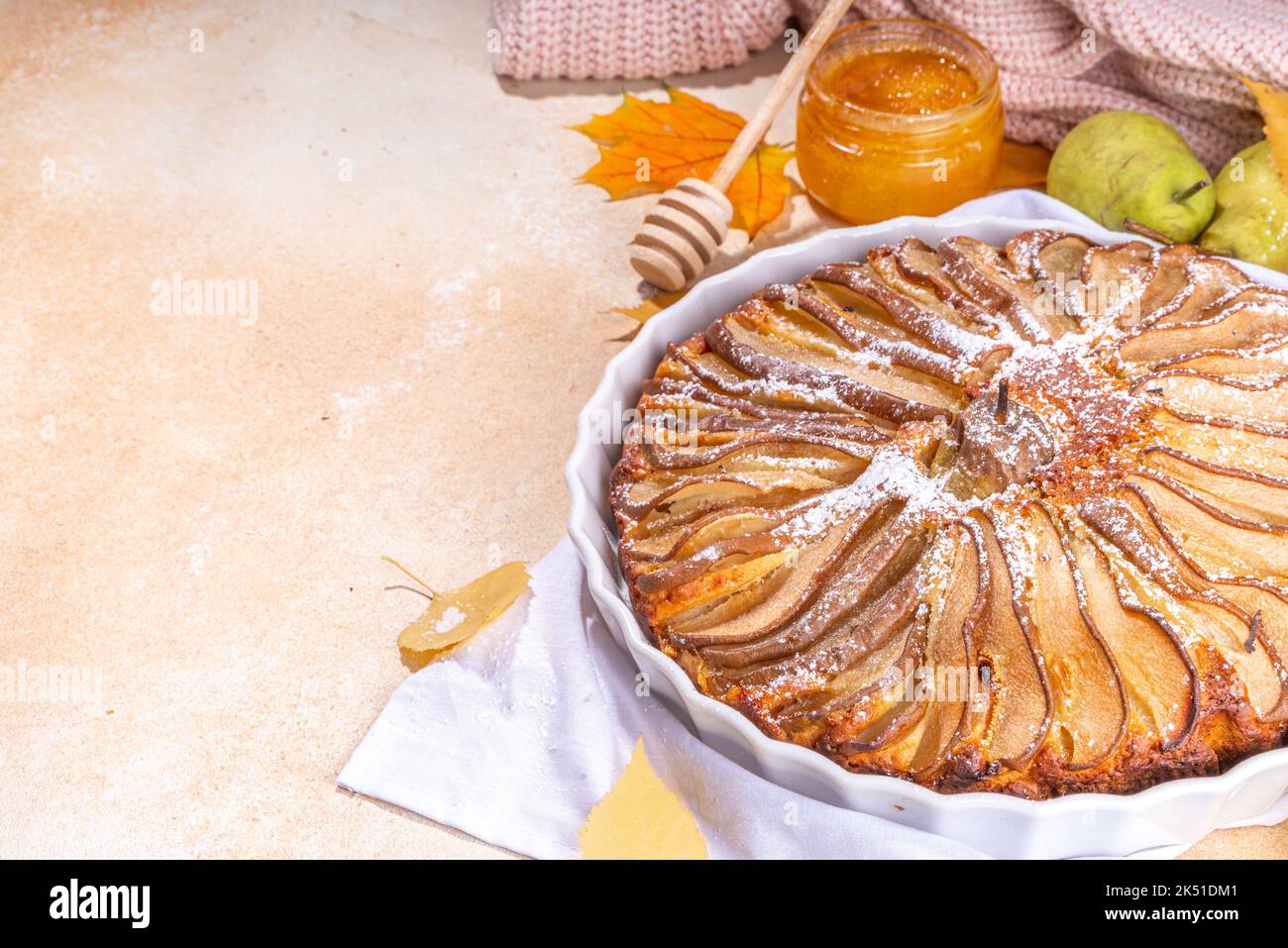 Homemade pear pie, sponge cake with sliced pear, cinnamon and honey ...