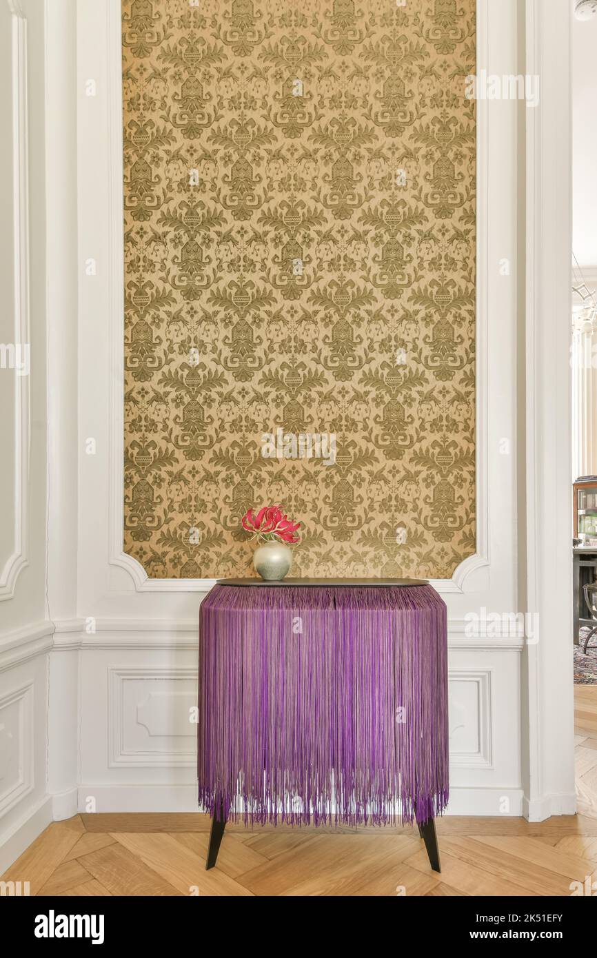 Interior passage way with small table on wall in modern house Stock ...
