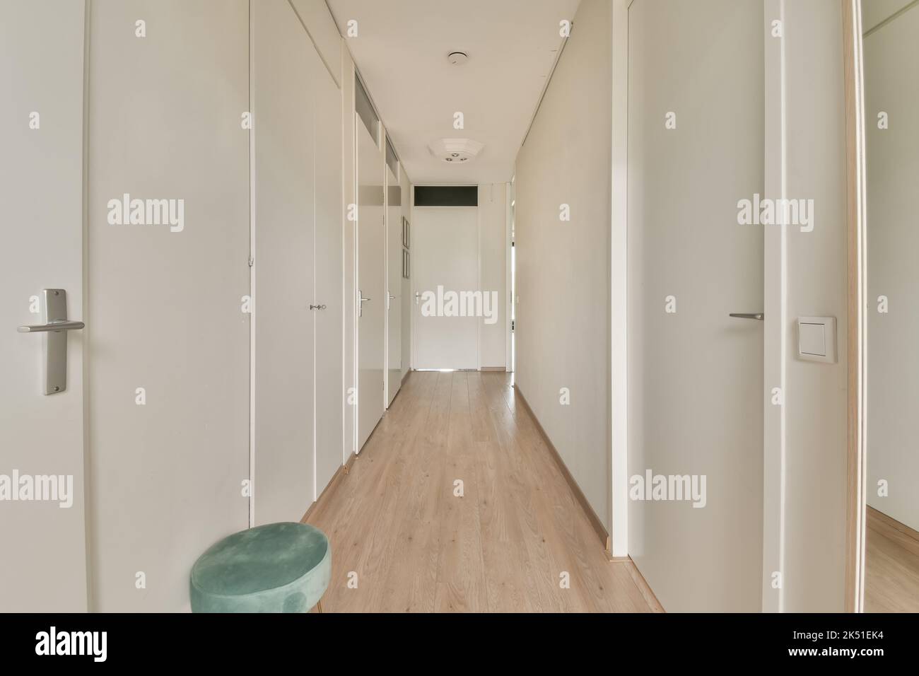 Interior passage way with parquet in modern house Stock Photo - Alamy