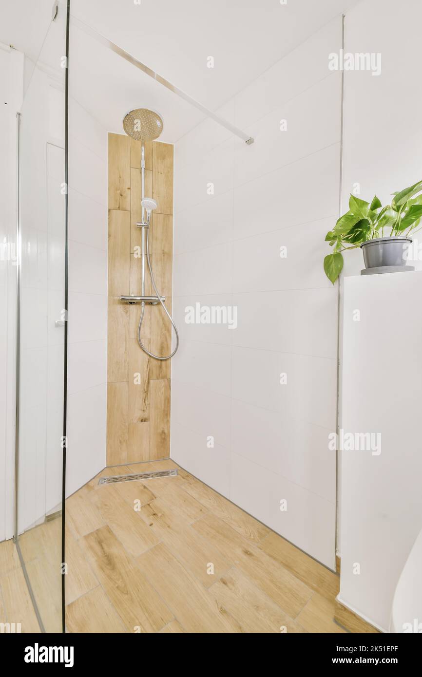 Interior of a modern shower with white walls Stock Photo - Alamy