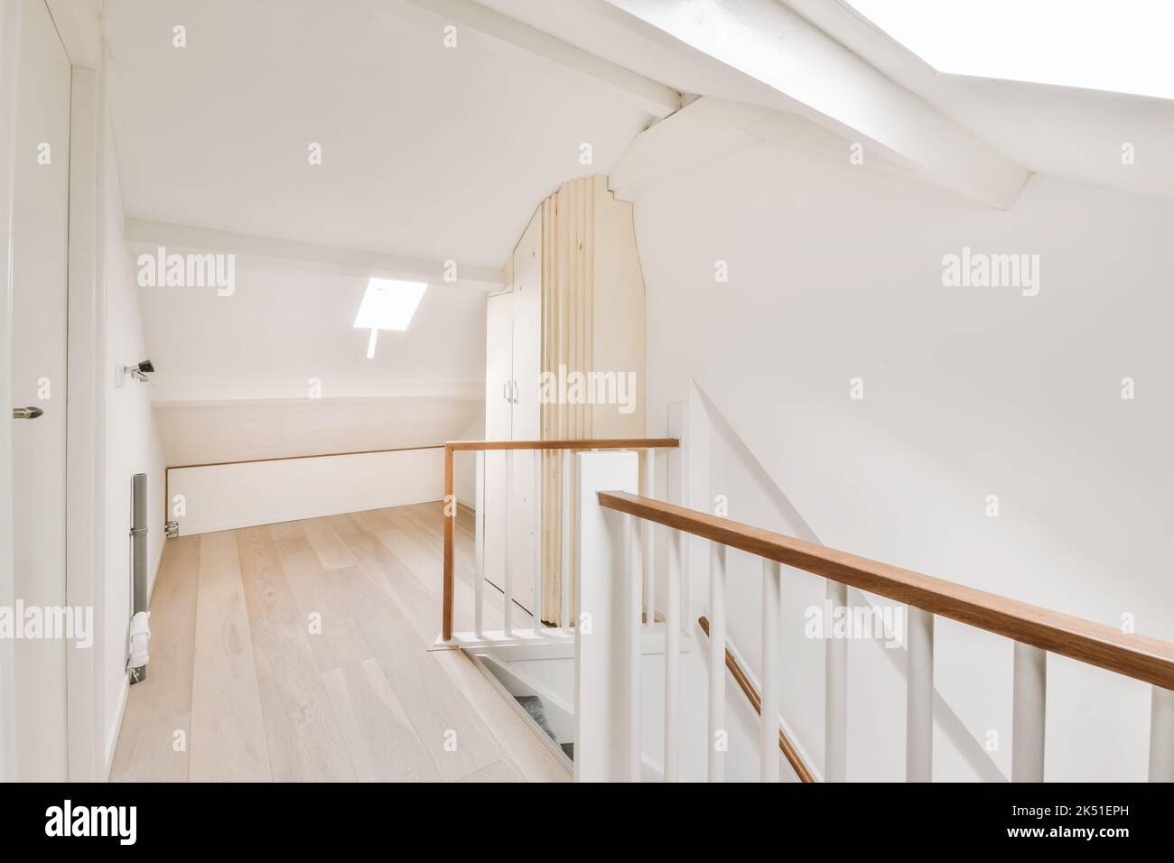 Interior passage way in bright modern house with parquet floor Stock ...