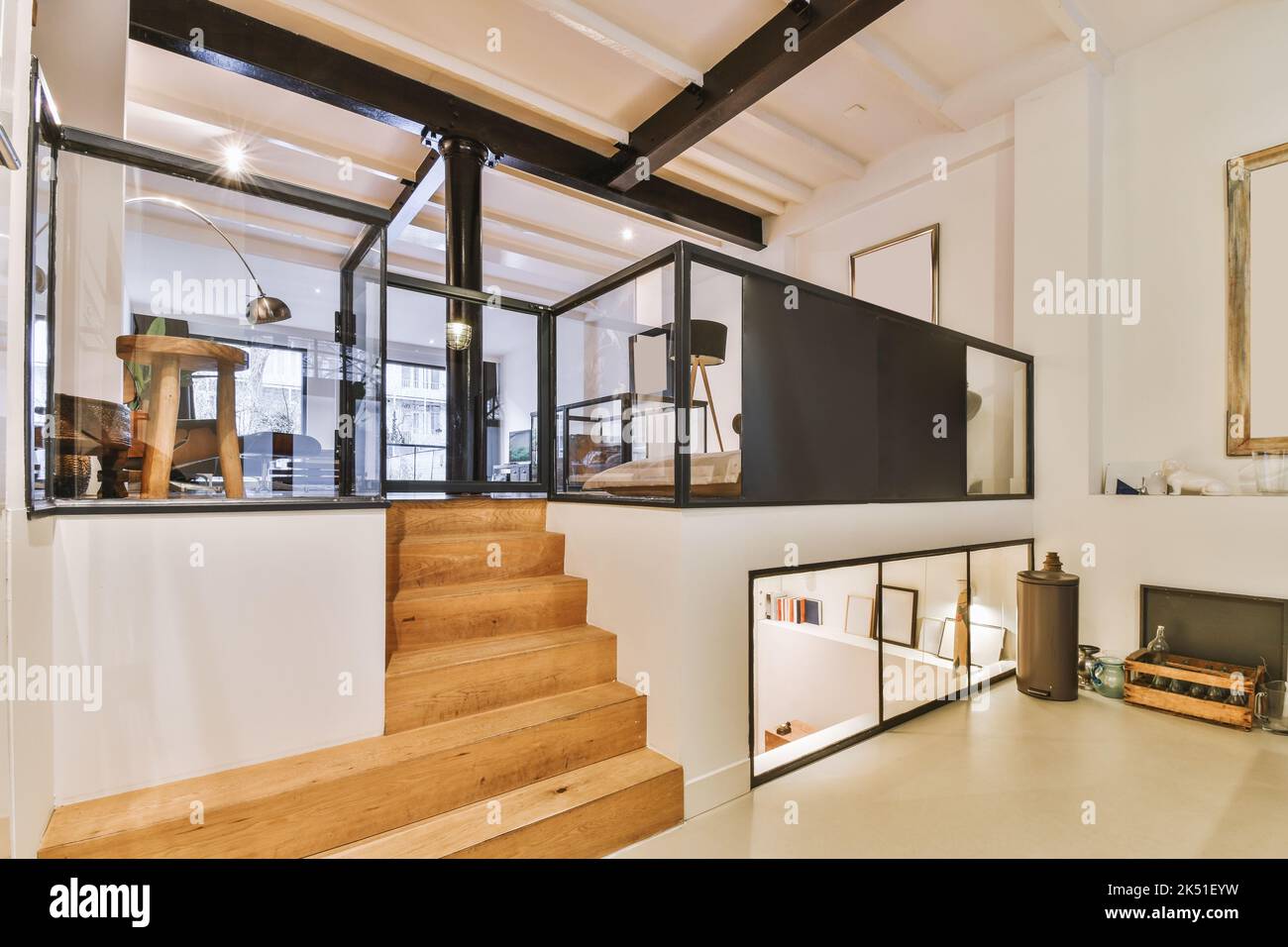 big loft house divided in different floors by stairs with living room ...