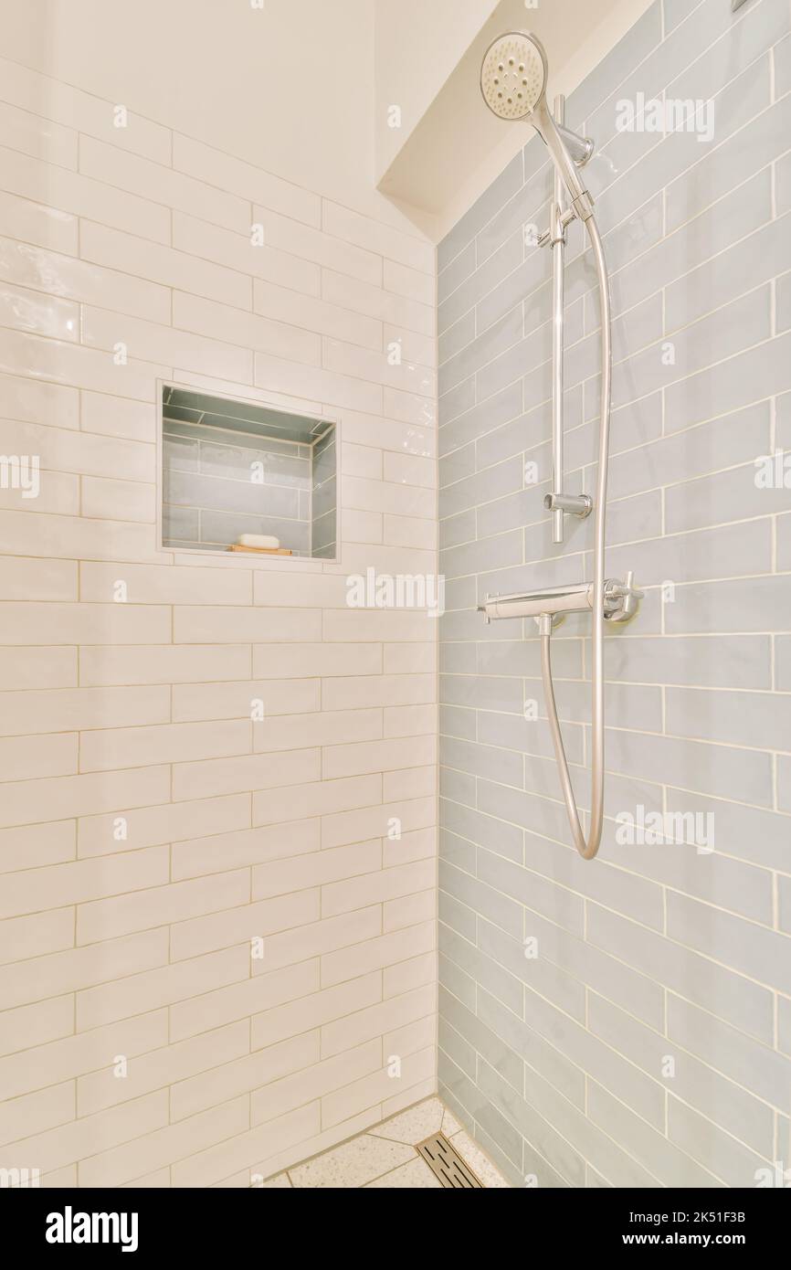 Interior of a modern shower with white walls Stock Photo - Alamy