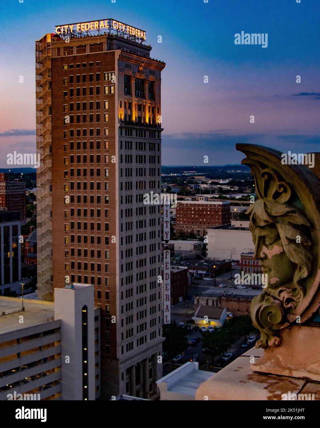 A vertical of a City Federal building with the background of a ...