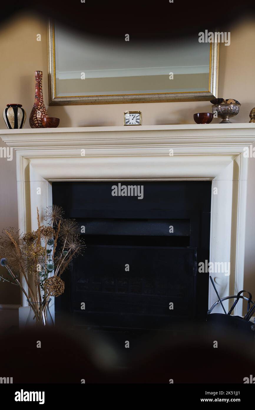 Classic contemporary home interior includes fireplace and neutral ...