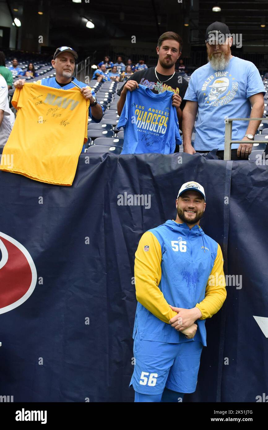 Los Angeles Chargers defensive end Morgan Fox (56) poses with fans ...