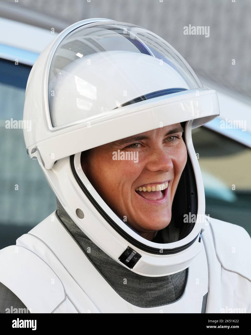 Russian cosmonaut Anna Kikina walks out with the rest of NASA's fifth ...