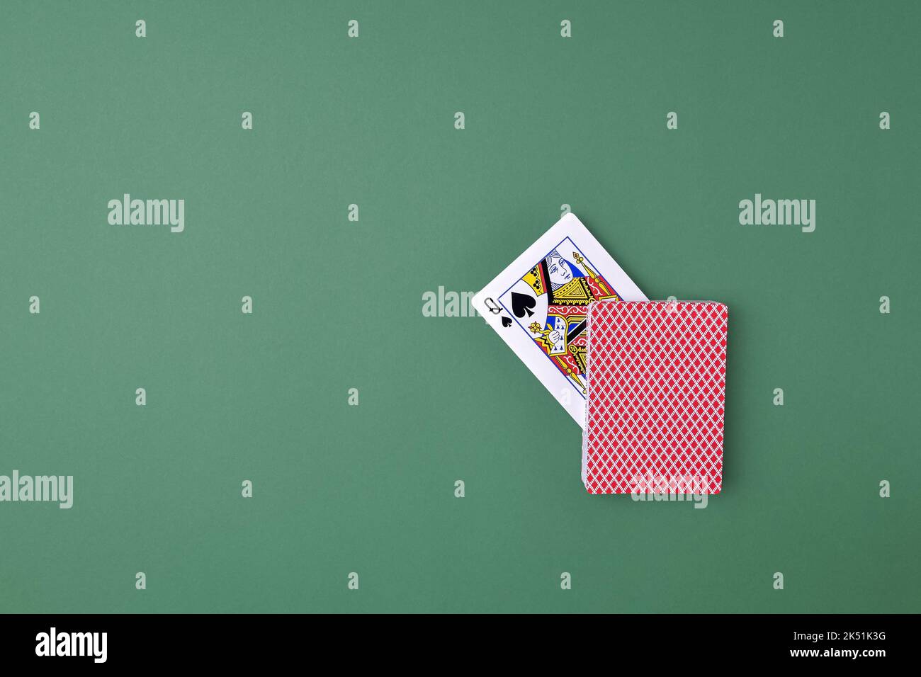 Full deck of playing cards on green background. Cards of Queen of ...