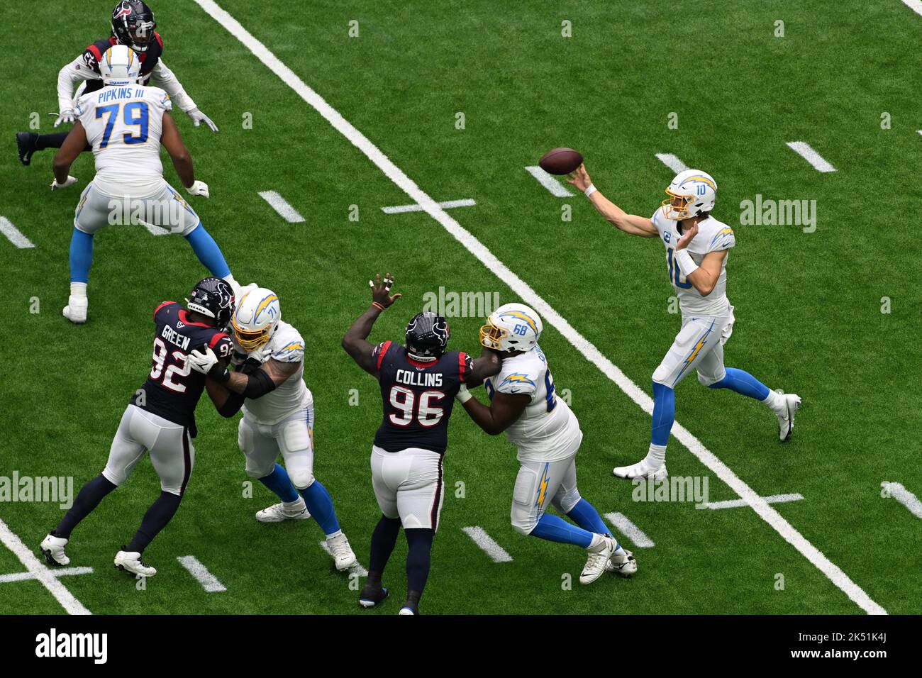 Los Angeles Chargers quarterback Justin Herbert (10) throws a pass under good protection in the ...