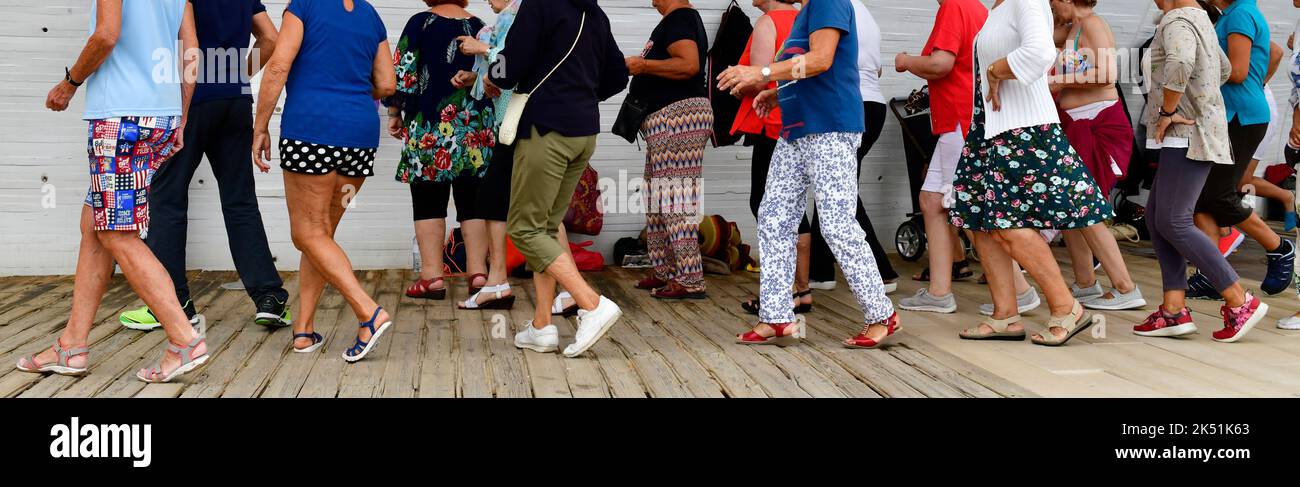 Group of senior citizens dancing in the street. Health for the elderly ...