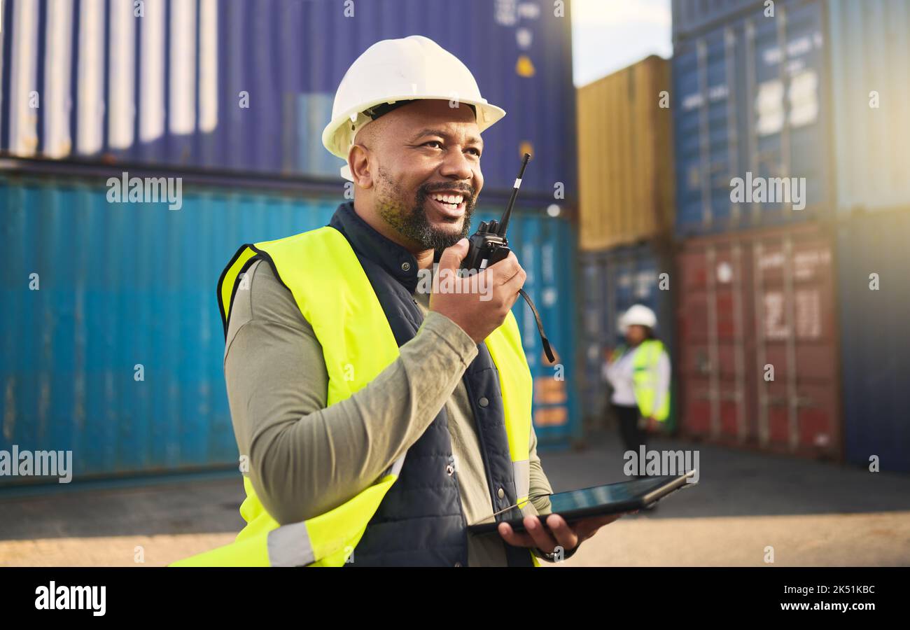 Logistics, radio and a black man in shipping container yard with tablet ...