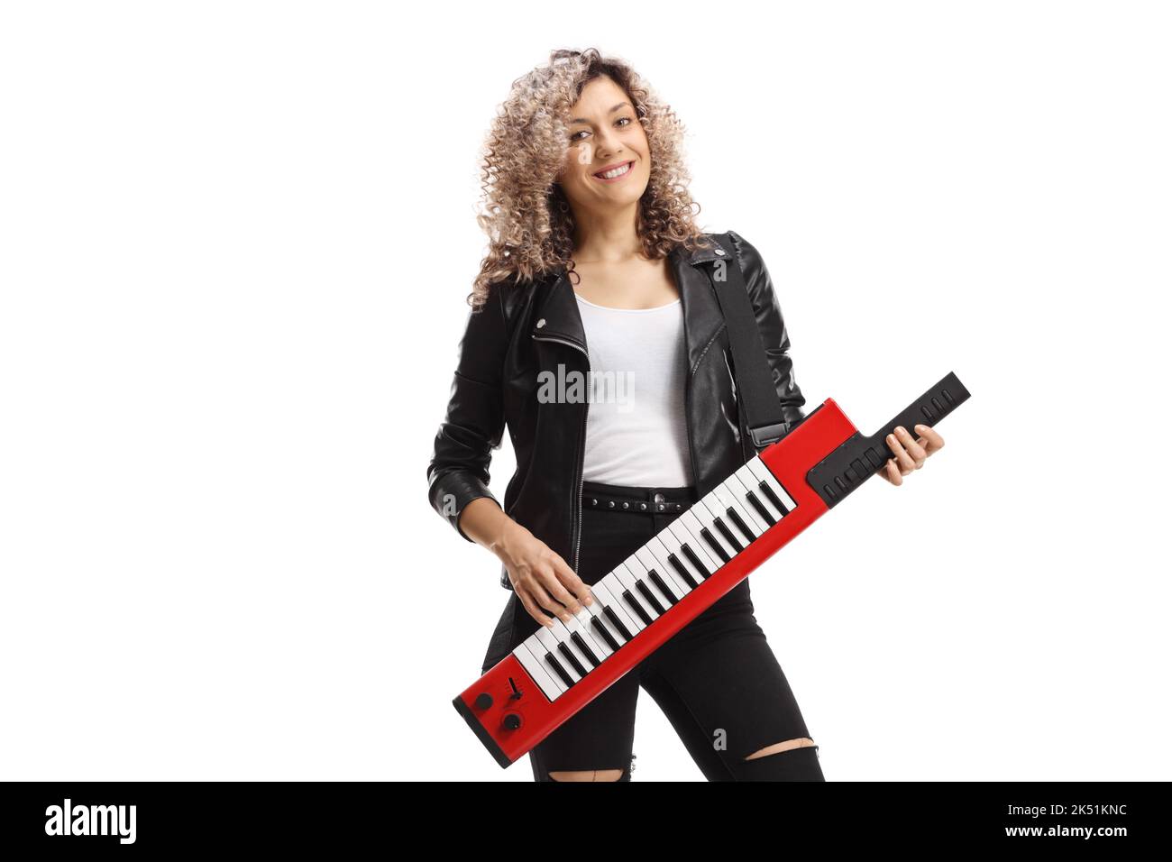 Female musician playing a keytar synthesizer isolated on white ...