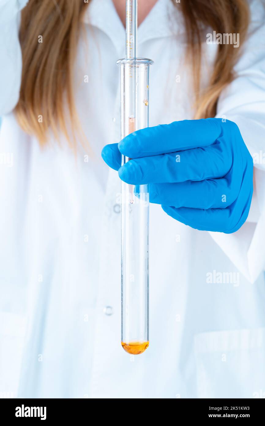 Scientific experiments in a chemistry lab. Color liquids and test tube ...