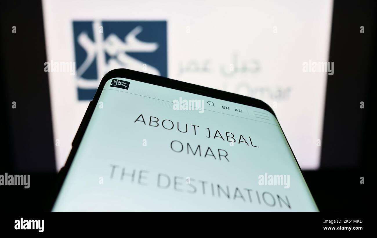 Mobile phone with website of Jabal Omar Development Company SJSC on ...