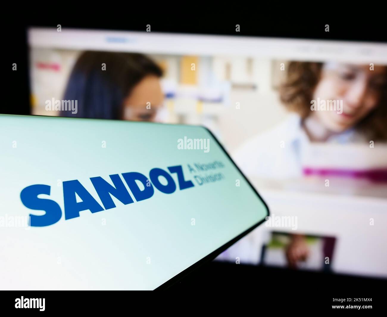 Cellphone with logo of pharmaceutical company Sandoz International GmbH ...