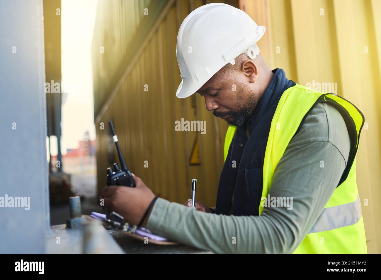 Logistics, supply chain and documents with a man shipping worker on a ...