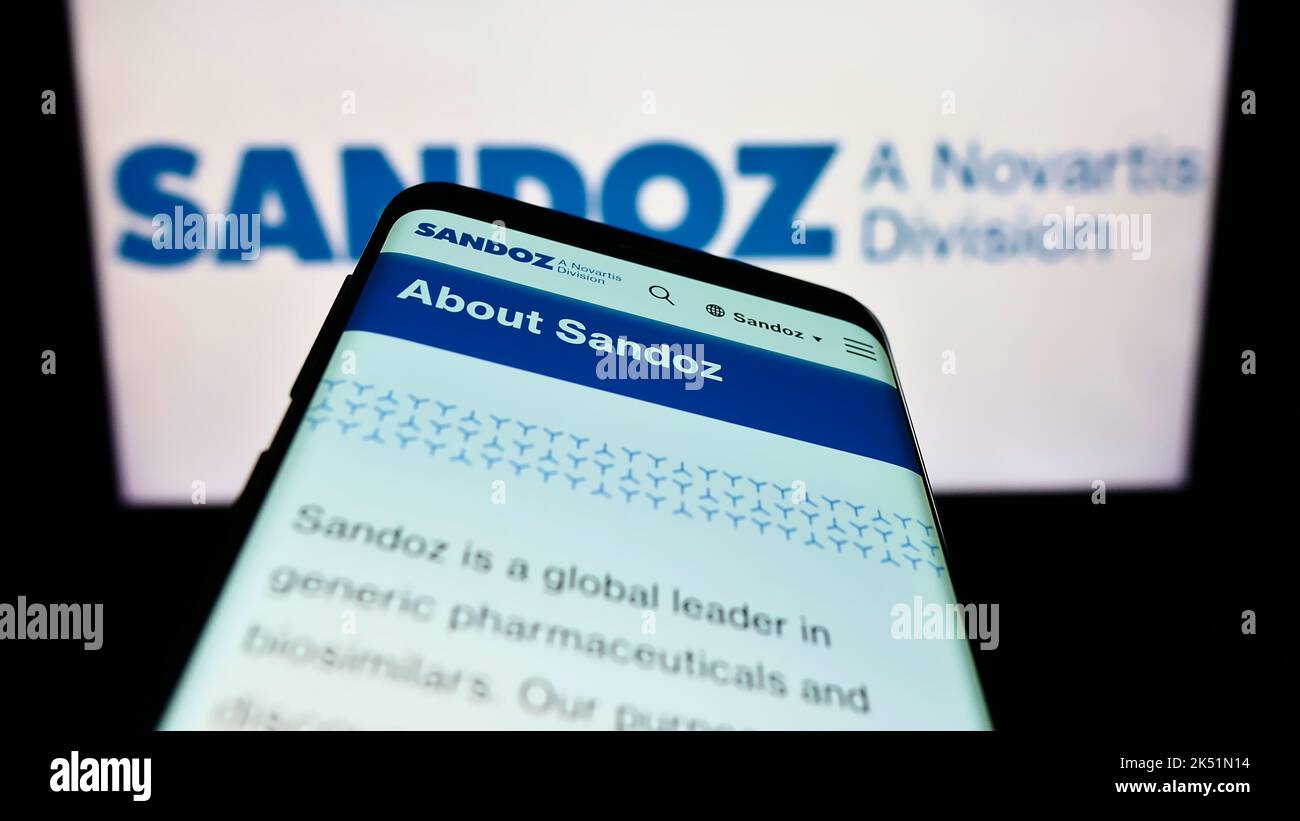 Mobile phone with webpage of pharmaceutical company Sandoz ...