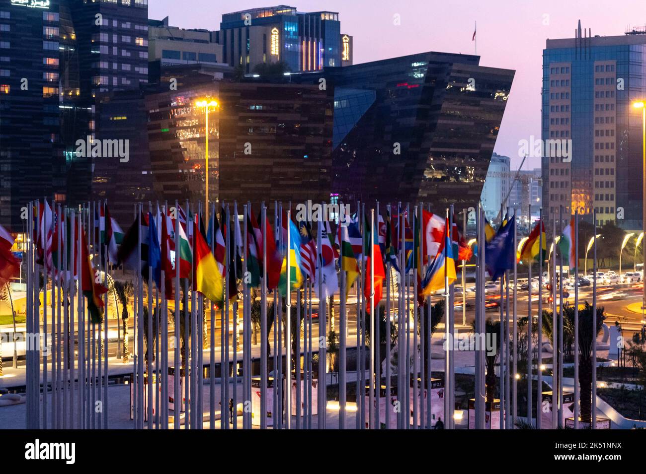 A visitor takes a photograph of 120 flags, from all countries ...