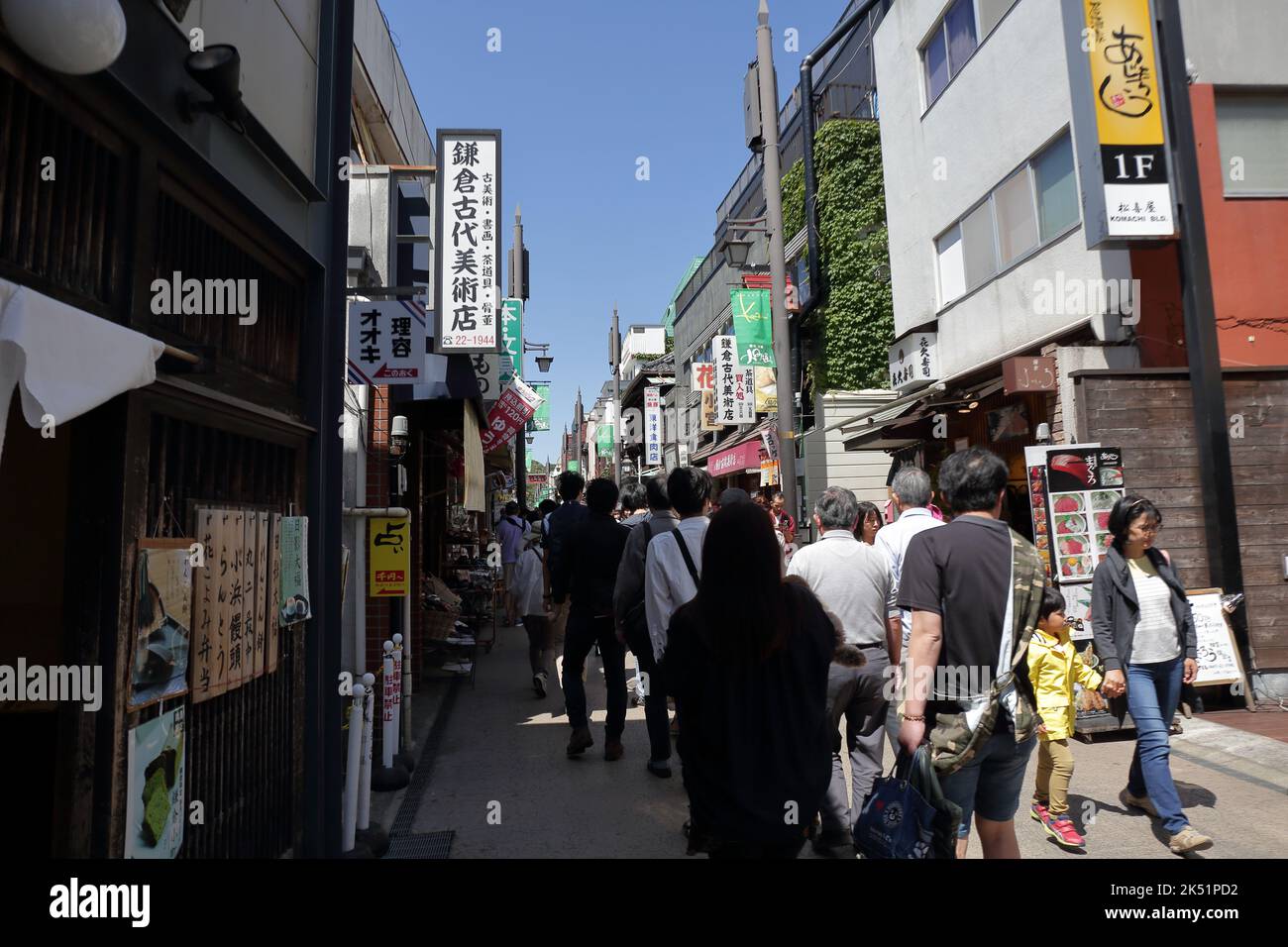 Many tourists visit the famous Komachi Street in historic Kamakura city ...