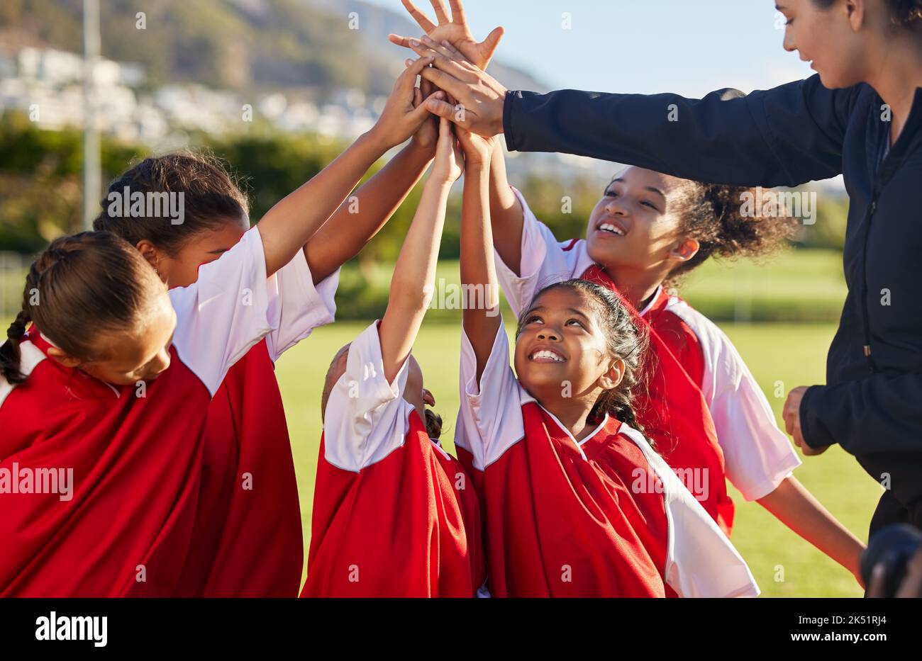 Children high five soccer hi-res stock photography and images - Alamy