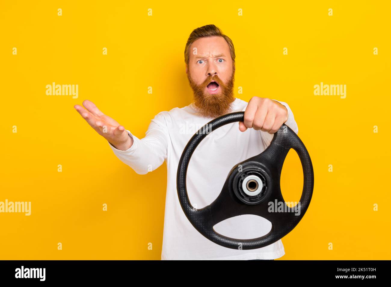 Photo unsatisfied furious person guy hand arm hold wheel yell scream ...