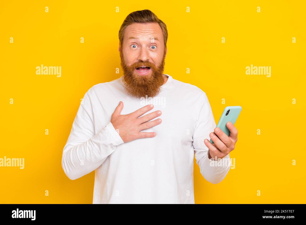 Portrait photo of young smiling shock crazy redhair man touch chest ...