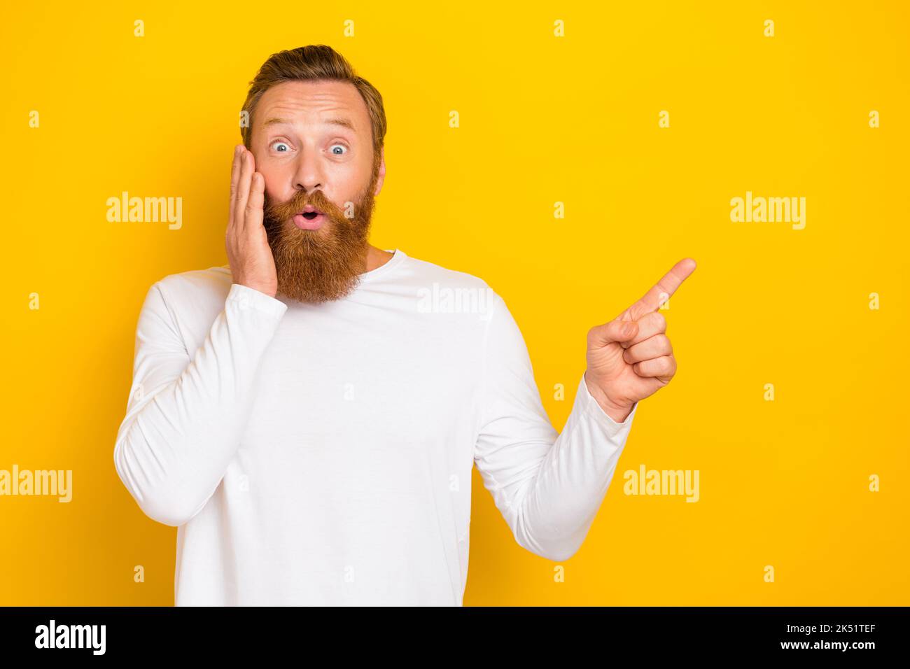 Closeup photo of young emotional funny face redhair guy directing ...