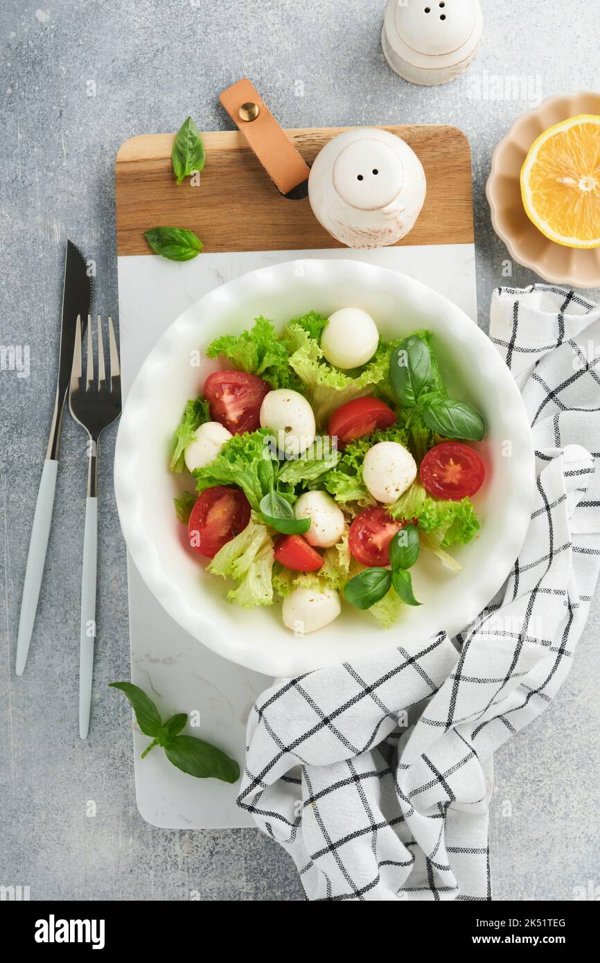 Caprese salad. Italian caprese salad with sliced tomatoes, mozzarella ...