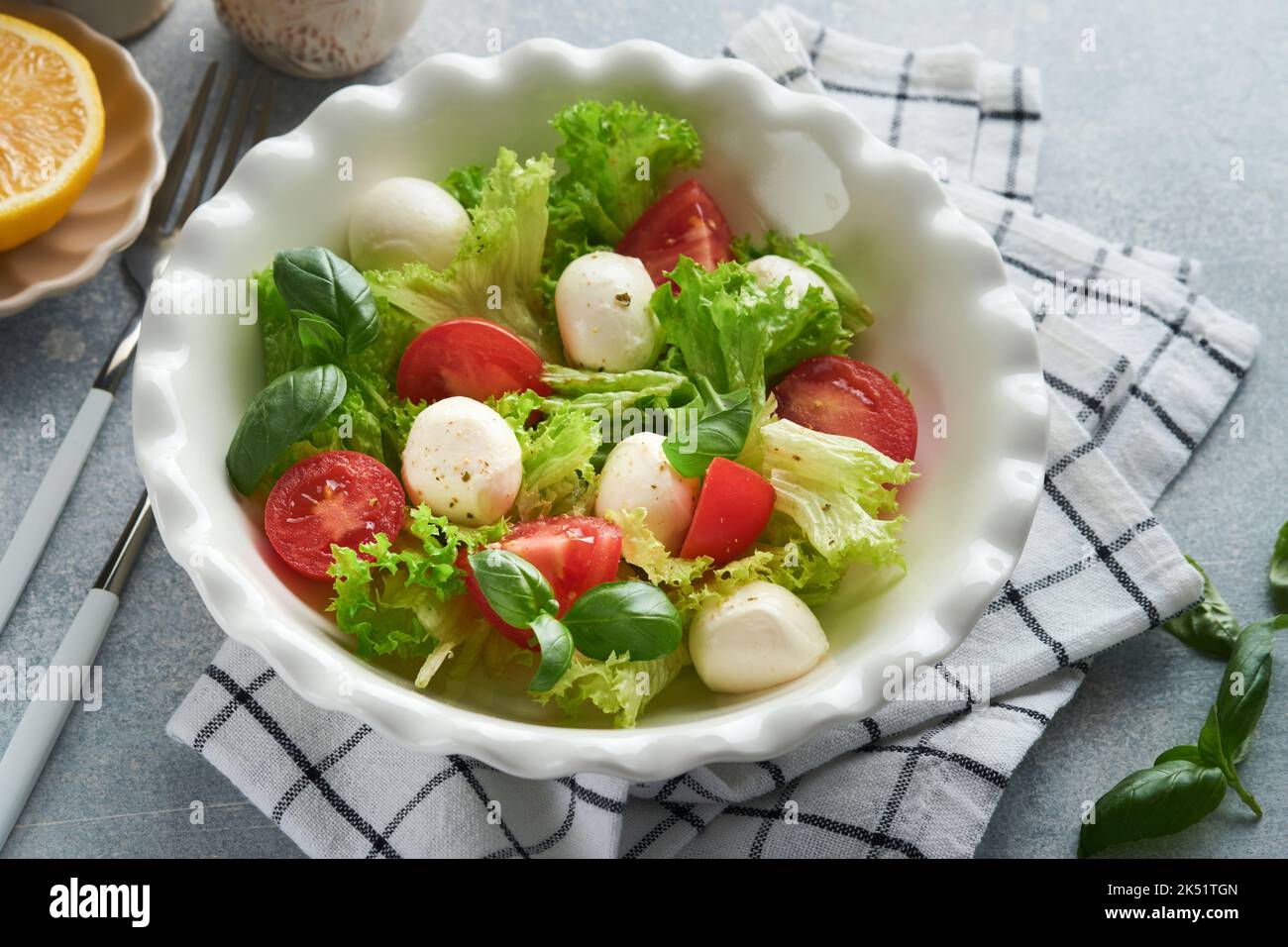 Caprese salad. Italian caprese salad with sliced tomatoes, mozzarella ...